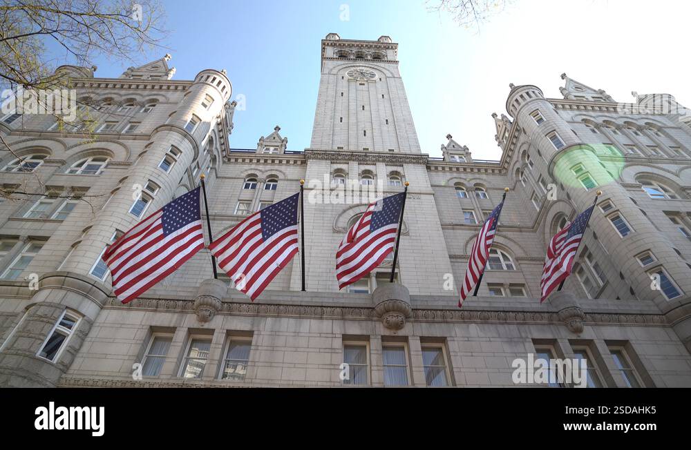 Looking up at tower and camera tilting down to the entrance to the ...