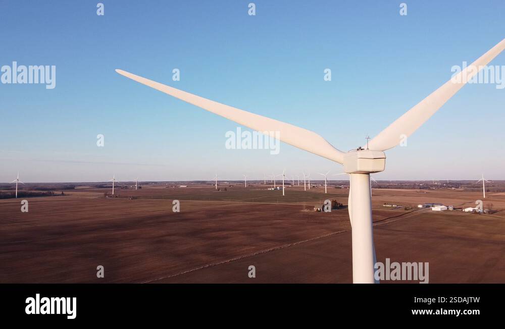 Flying behind an Ubly, Michigan windmill overlooking the wind farm ...