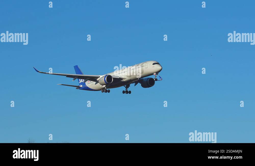 airplane sas new airbus a350 in beautiful sunshine passing by Stock ...