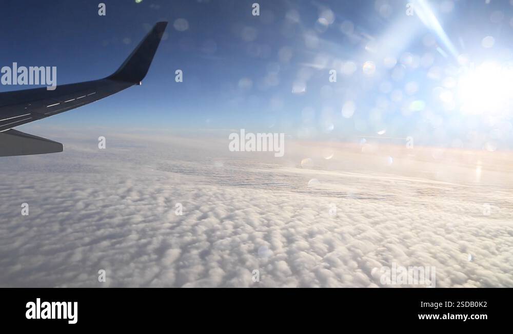 View from a commercial Delta airline window seat containing a wing of ...