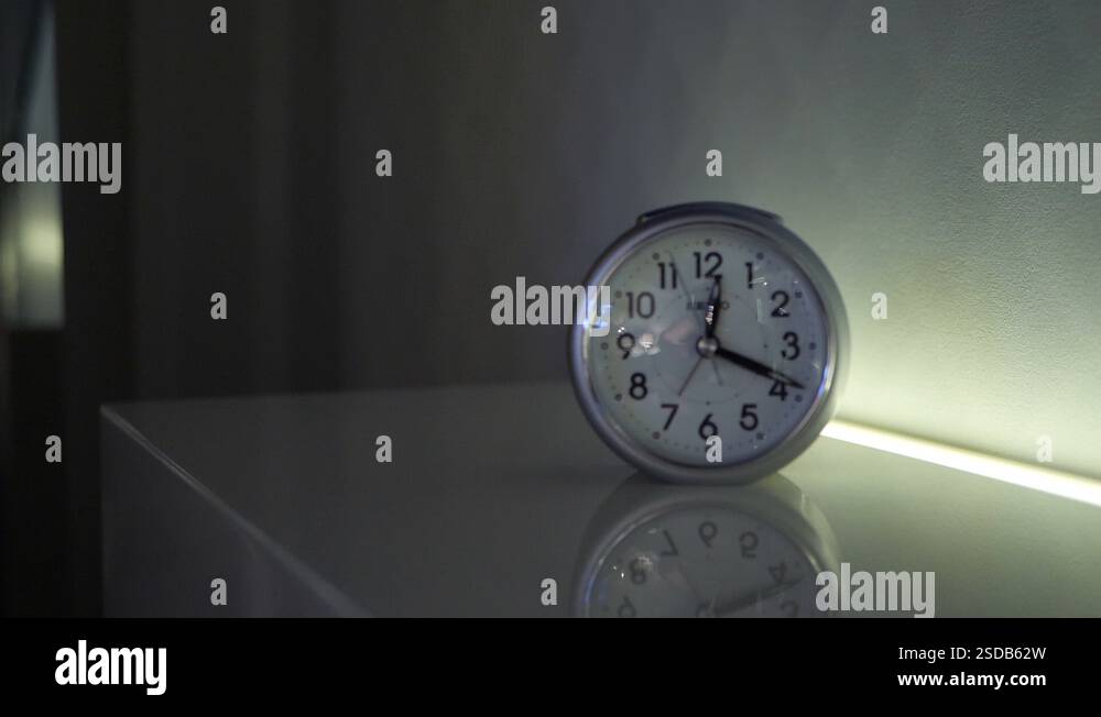 Alarm clock on side table after midnight.mp4 Stock Video Footage - Alamy