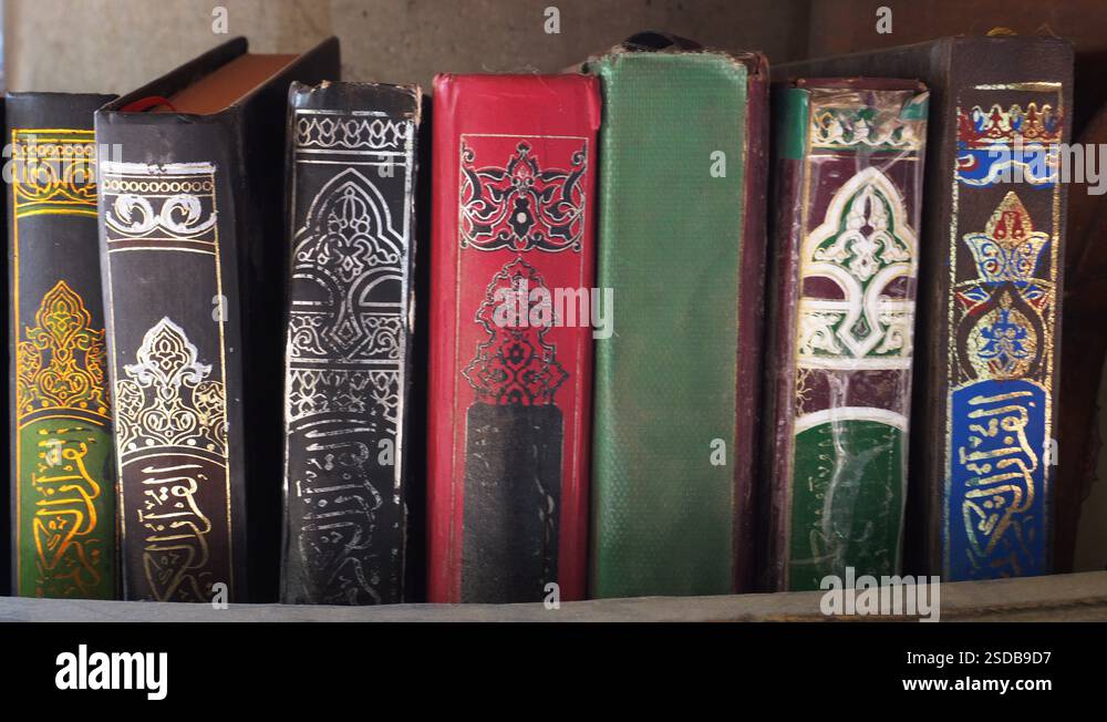 Row of Muslim Quran Islamic holy books lay in mosque for religious ...