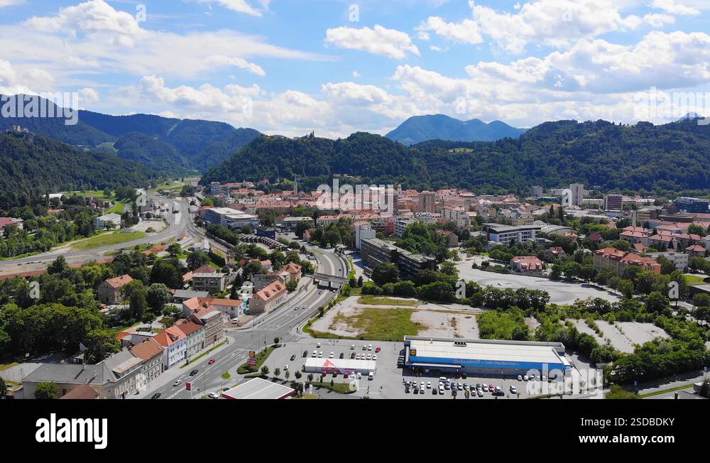 Aeraial: bird's eye view of the Celje city in Slovenia and golovec ...