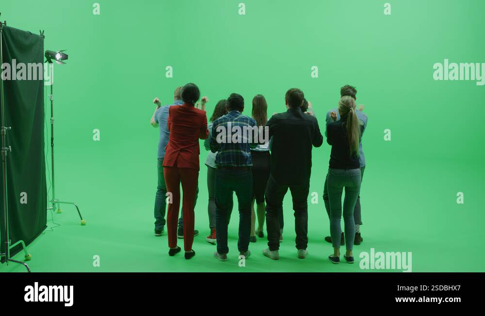 Green Screen Chroma Key Studio: Diverse Row of Seven Fans Cheering ...