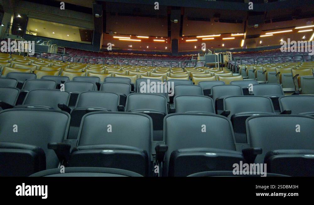 Seats at empty sports concert arena - wide tracking shot Stock Video ...