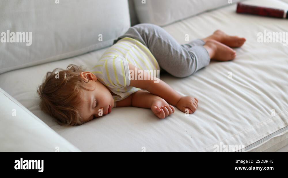 Little baby napping on home couch. Cute infant toddler sleeping ...
