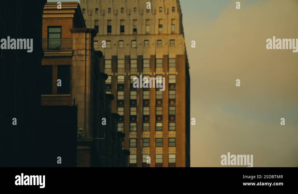 New York City skyscrapers. Urban setting BOOM DOWN to busy streets ...