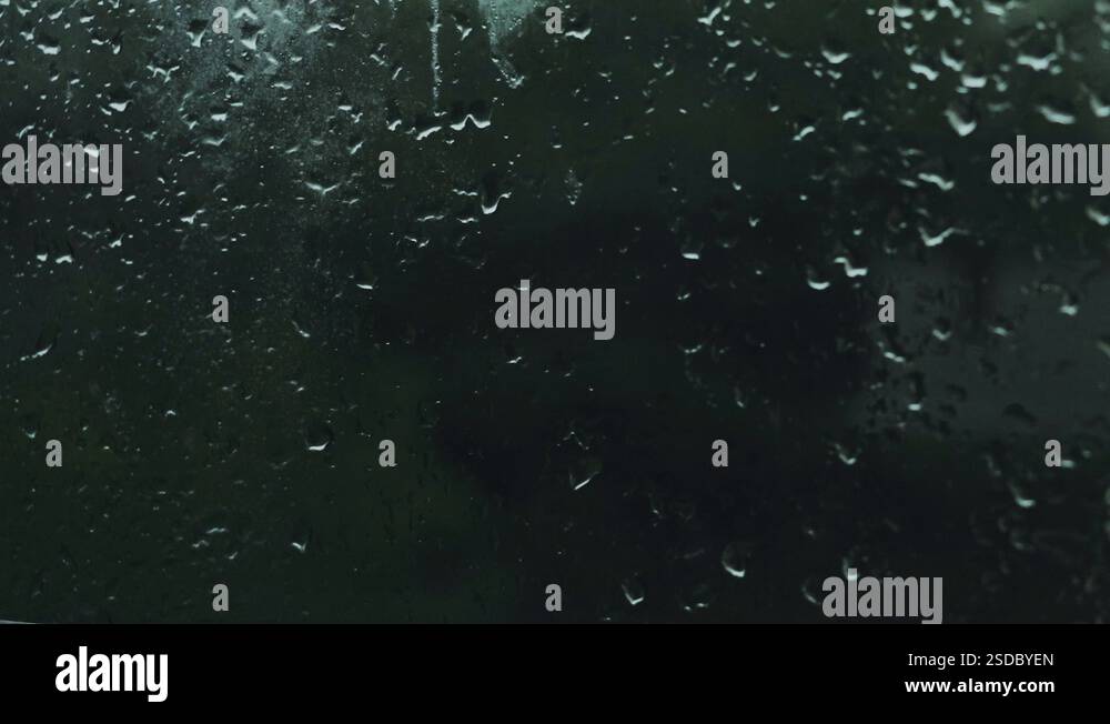 rain droplets rainwater on the window on a rainy day Stock Video ...