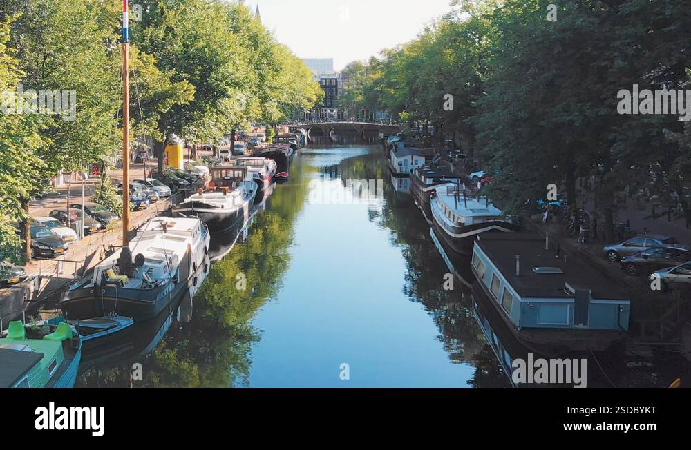 Amsterdam canal boats trees Stock Videos & Footage - HD and 4K Video ...