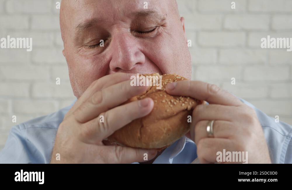 Hungry Person Eating a Tasty Hamburger, Enjoy Delicious Fast Food Stock ...