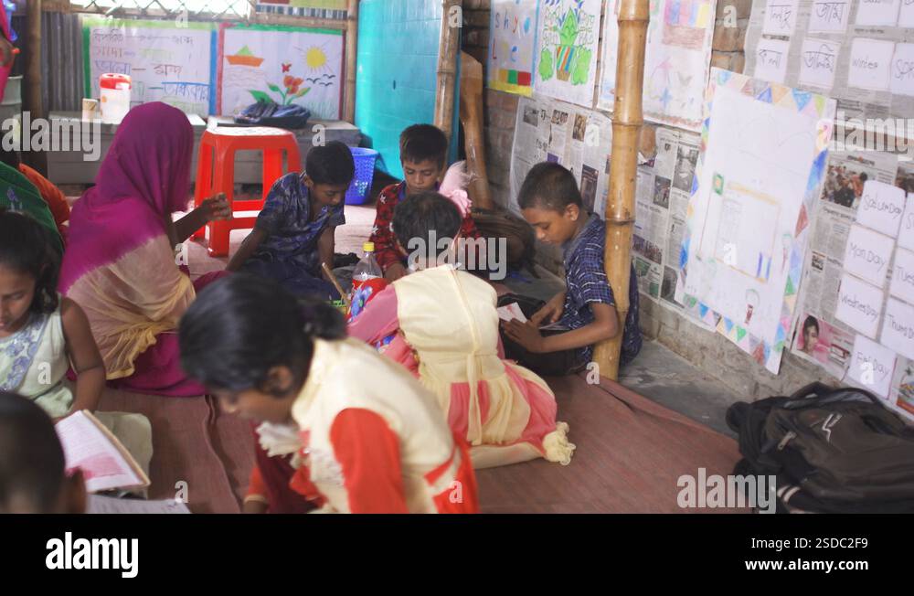 A group of poor child reading in a school of Bangladesh Stock Video ...