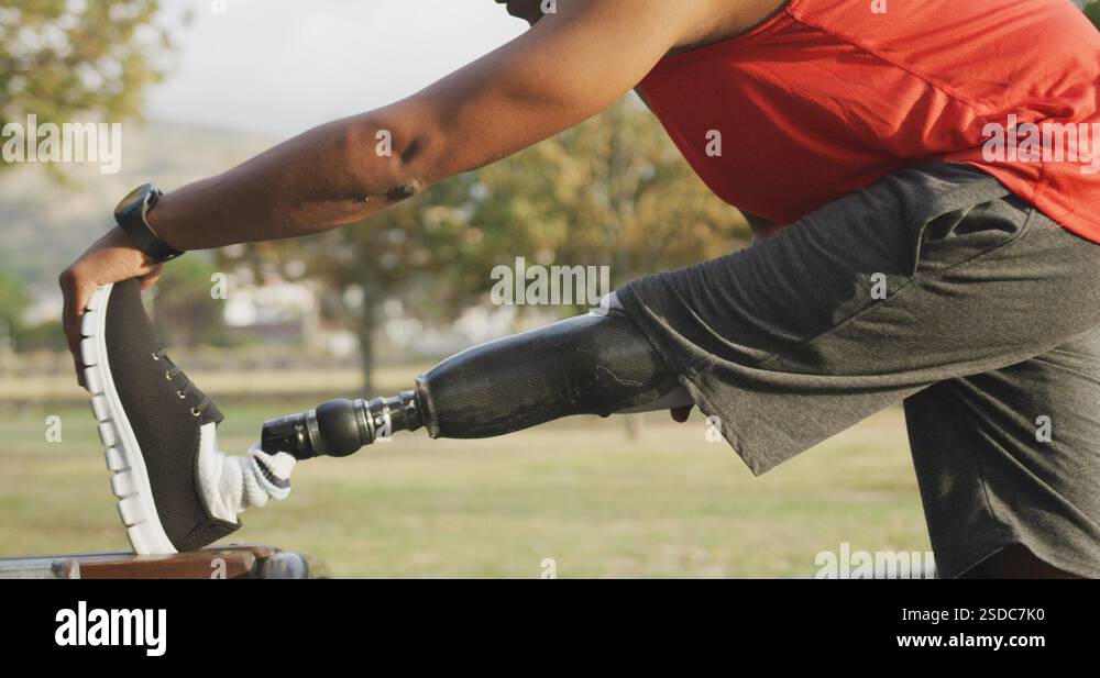 Side view man with prosthetic leg stretching Stock Video Footage - Alamy