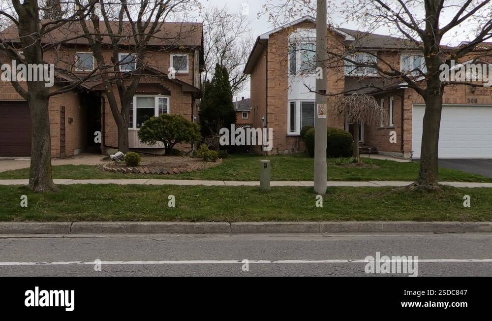 POV side view suburban residential neighbourhood in Markham Canada ...