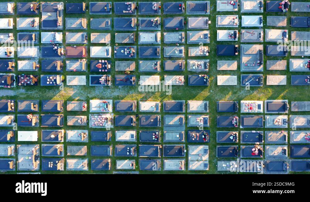 Tombs in a large cemetery with grid layout - aerial top down view Stock ...