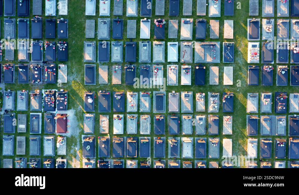 Tombs in a large cemetery with grid layout - aerial top down view Stock ...
