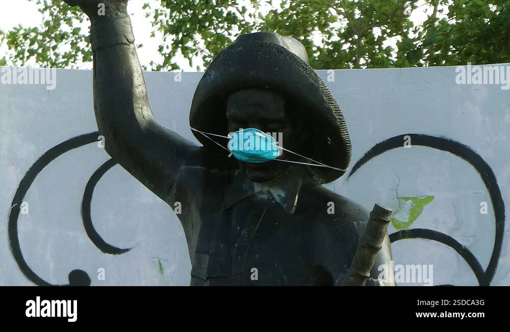 Statue of The Cane Man with a Mask On Stock Video Footage - Alamy