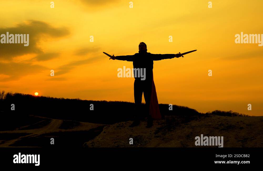 free male knight prays with swords outstretched hands. Superman with a ...