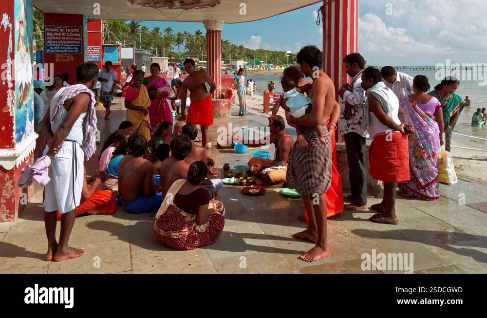 Hindu people people bathing in the Arabian Sea before entering the ...