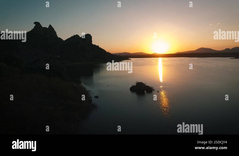 Outstandng sunset in Quixada (northeast Brazil) at the shore of Açude ...