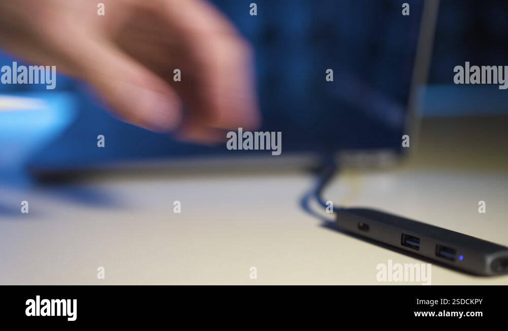 A man inserts a USB flash drive into a laptop Stock Video Footage - Alamy