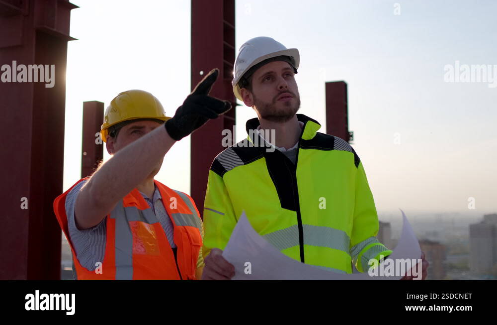 Two male builders engineers men, contractor investor worker foreman ...