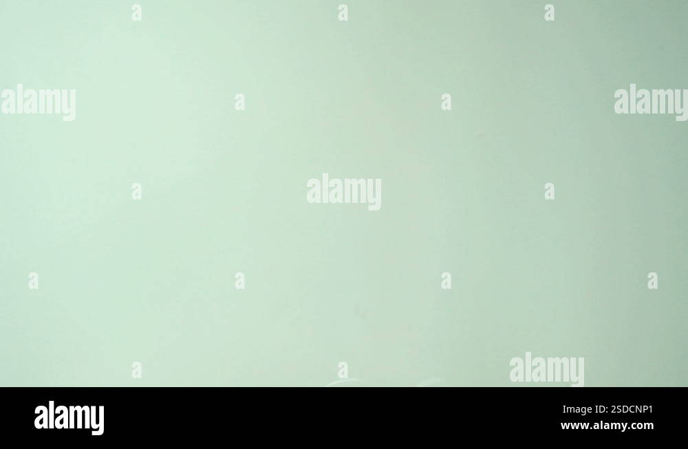 A drop falls in slow motion to the surface of the milk Stock Video ...