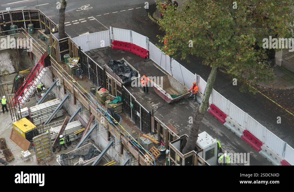 Empty Skip Being Lifted by Crane At Construction Site In Westminster ...
