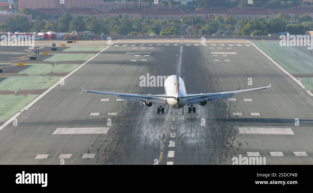 4K transportation footage with top view on a busy runaway strip ...