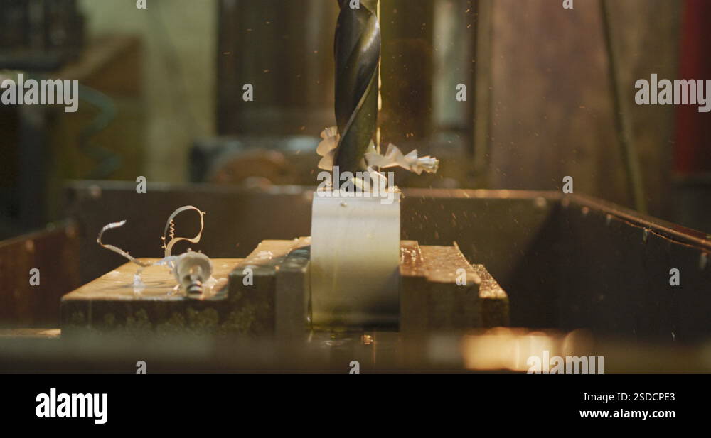 Part of bench drill at a factory drilling in piece of metal Stock Video ...