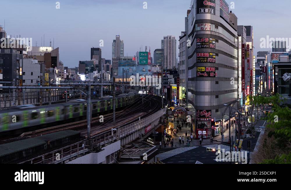 Trains Passing At The Ueno Station With Ameyokocho Market In Tokyo ...