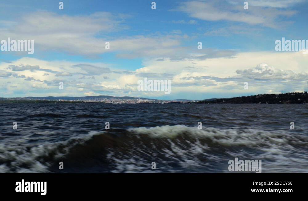 Big waves on a cloudy afternoon in Oslofjord during a fjord cruise ...