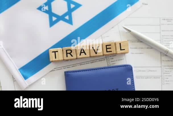 Word Travel of wooden cubes on visa application form with Israeli flag ...