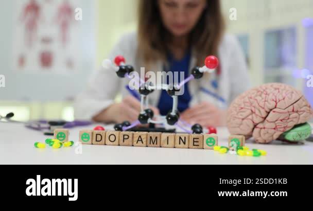 A molecular model of dopamine with a brain background, showcasing the ...