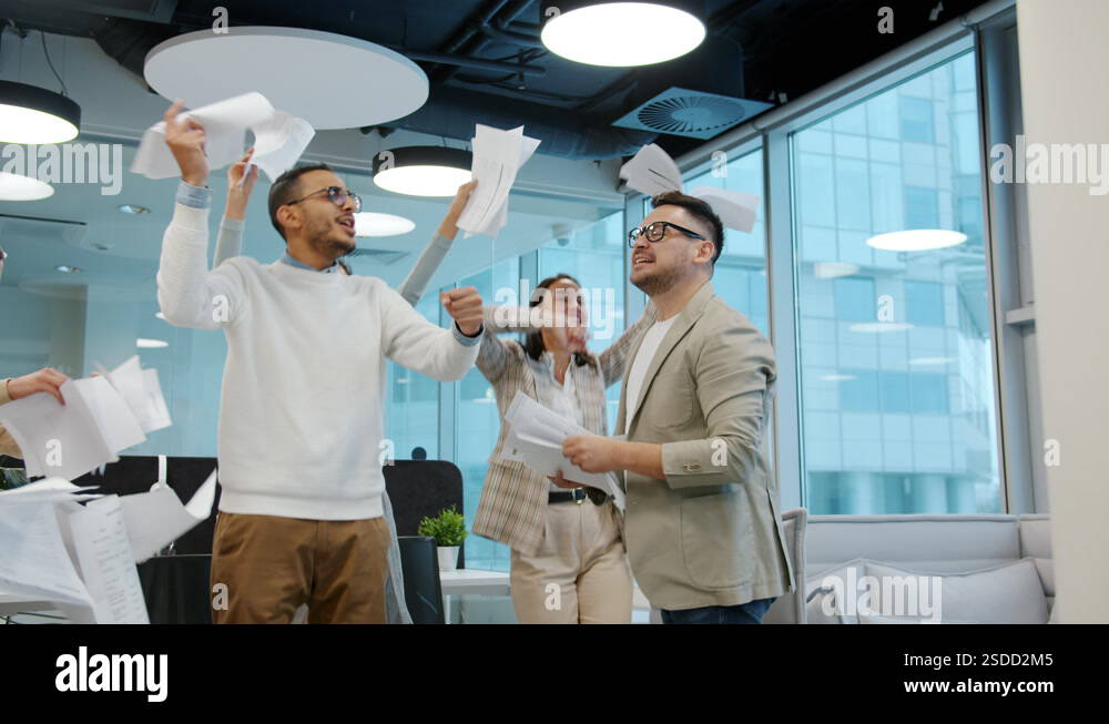 Happy office workers diverse group dancing in workplace having fun ...