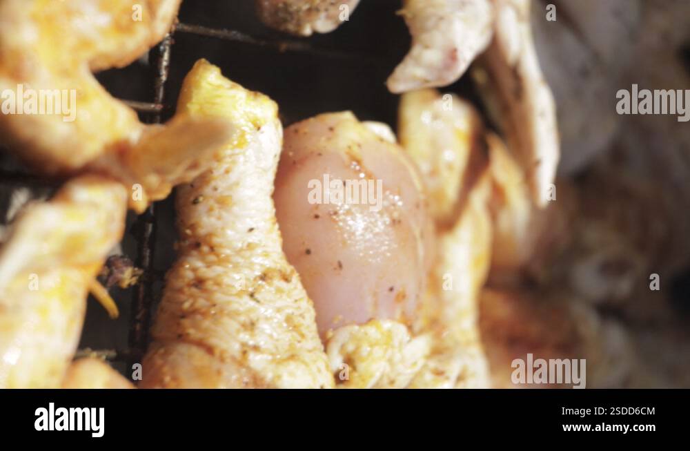 close up vertical view of meat being cooked on the grill Stock Video ...