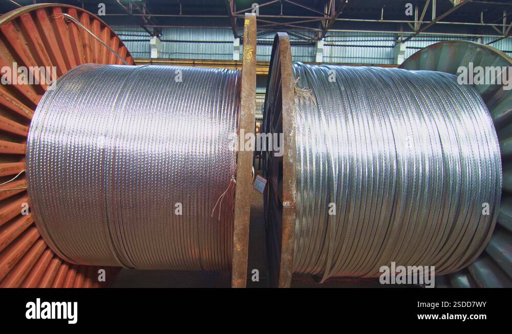 Cable factory. Metal, optical, copper, power wires are wound on huge ...