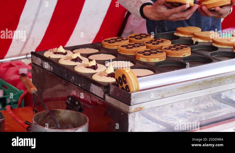 Street Food Vendor At Japan Market Stall Cooks Traditional Imagawayaki ...