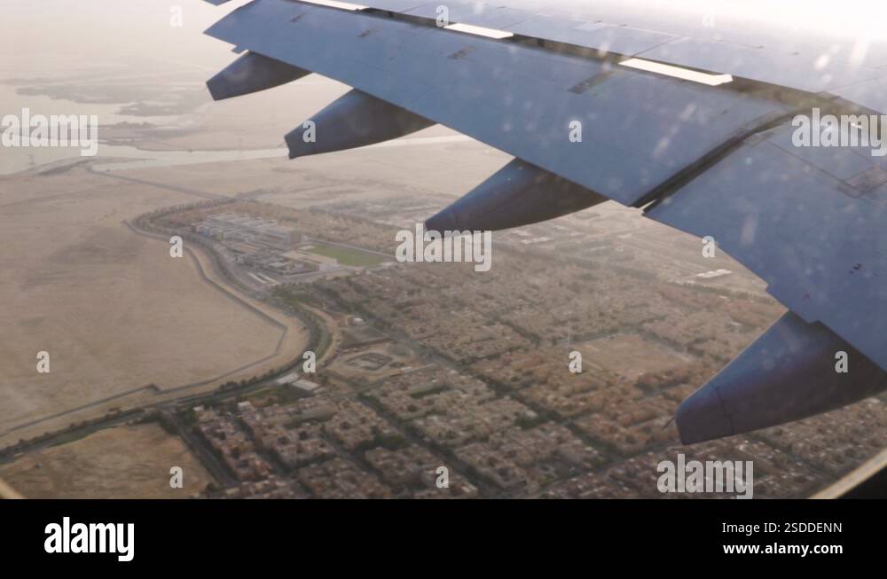 View from the left side window of an airplane on final approach to the ...