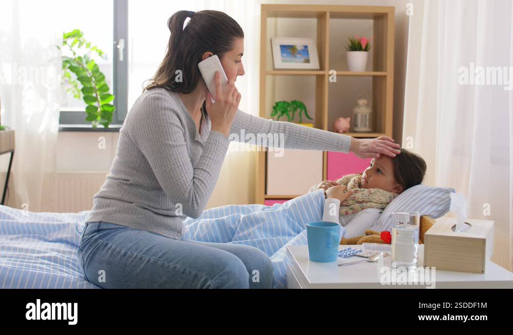 ill daughter and mother calling on phone at home Stock Video Footage ...