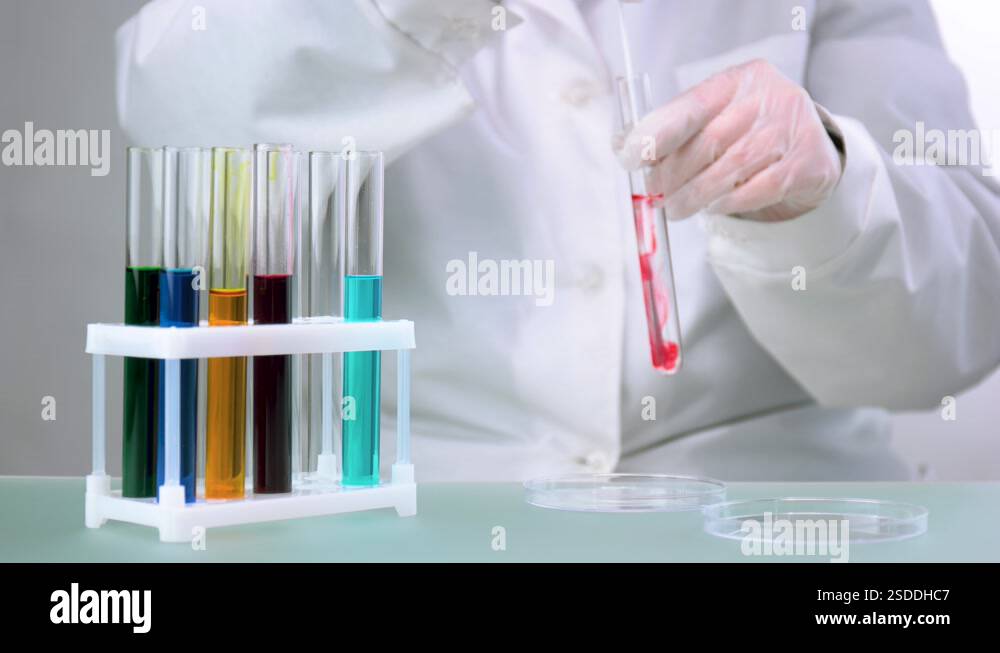 Scientist making a chemical experiment in research center Stock Video ...