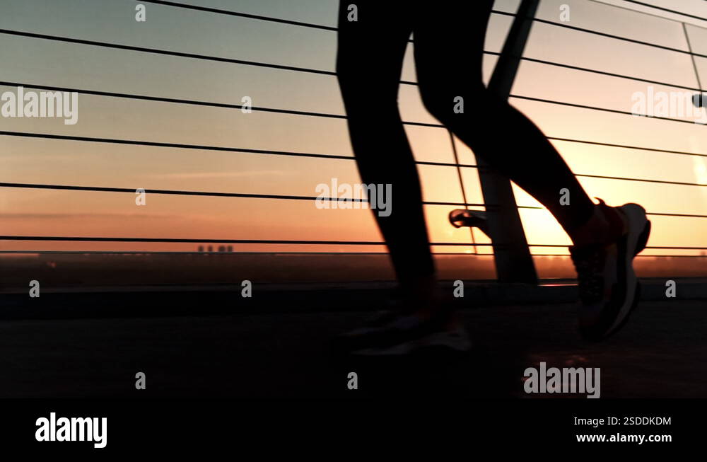 b roll female jogging in the evening Stock Video Footage - Alamy