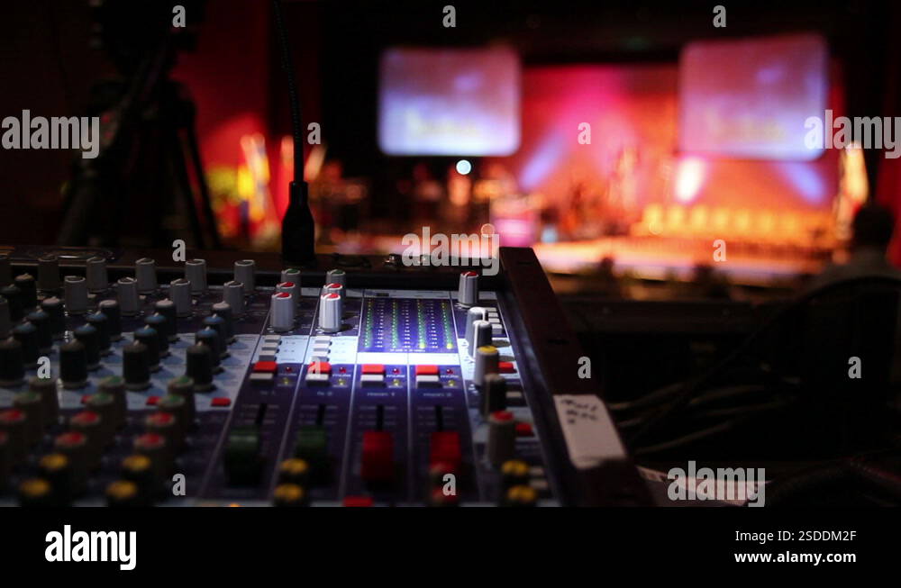 Audio mixer or mixing desk console at a live event or concert stage ...