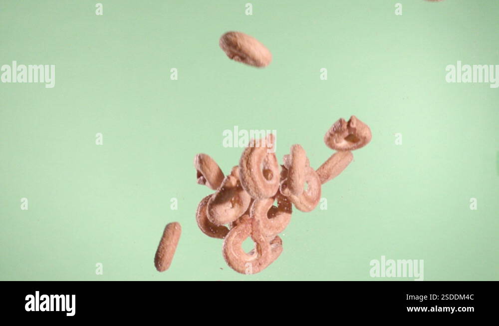 Super slow motion of a group of flying butter cookies. Lovely torcetti ...