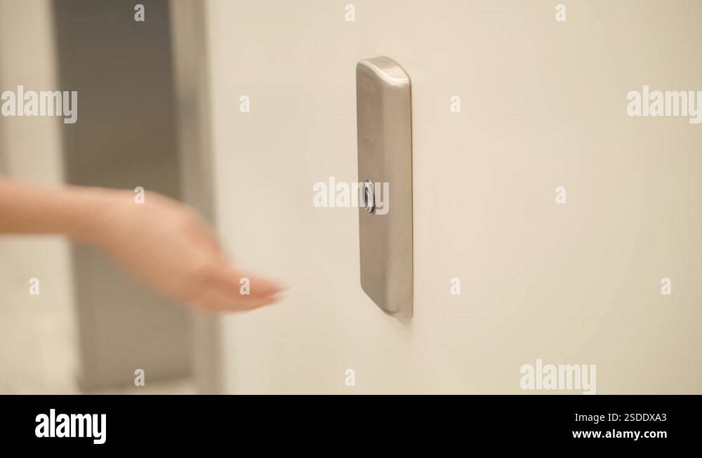 Woman Pressing Elevator Button In Office Building.Hand Pushing Elevator ...