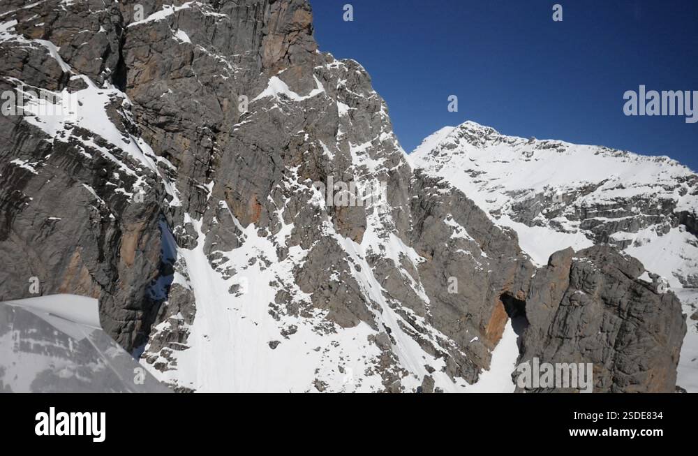 Snowy summit close up aerial Stock Videos & Footage - HD and 4K Video ...