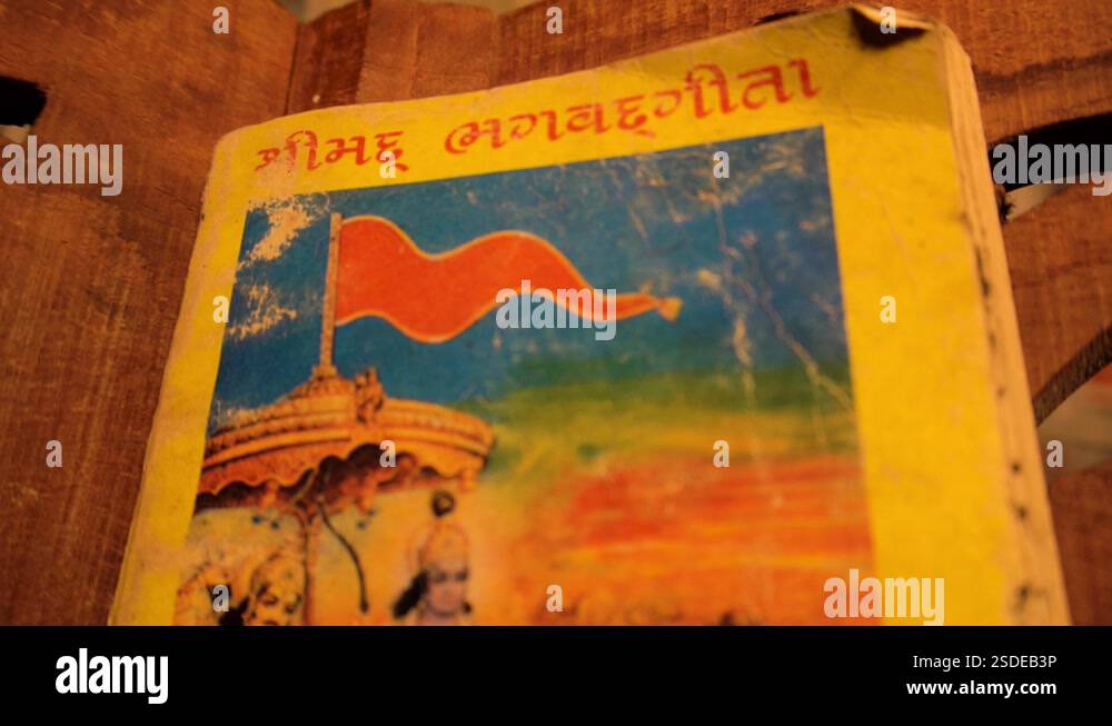 bhagwat geeta also Bhagavad Gita on the book stand Stock Video Footage ...