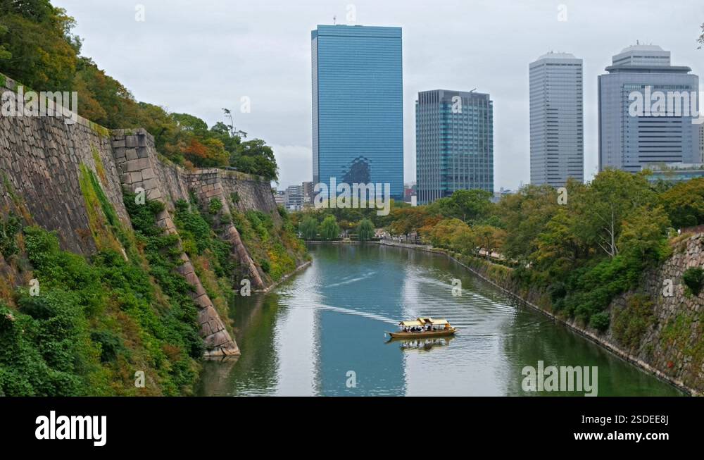 Inner moat of Osaka Castle with the Osaka Business Park on the ...