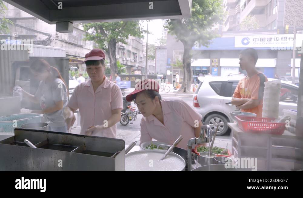 Chinese Female Cook Behind Steam in Open Fast Food Restaurant on ...