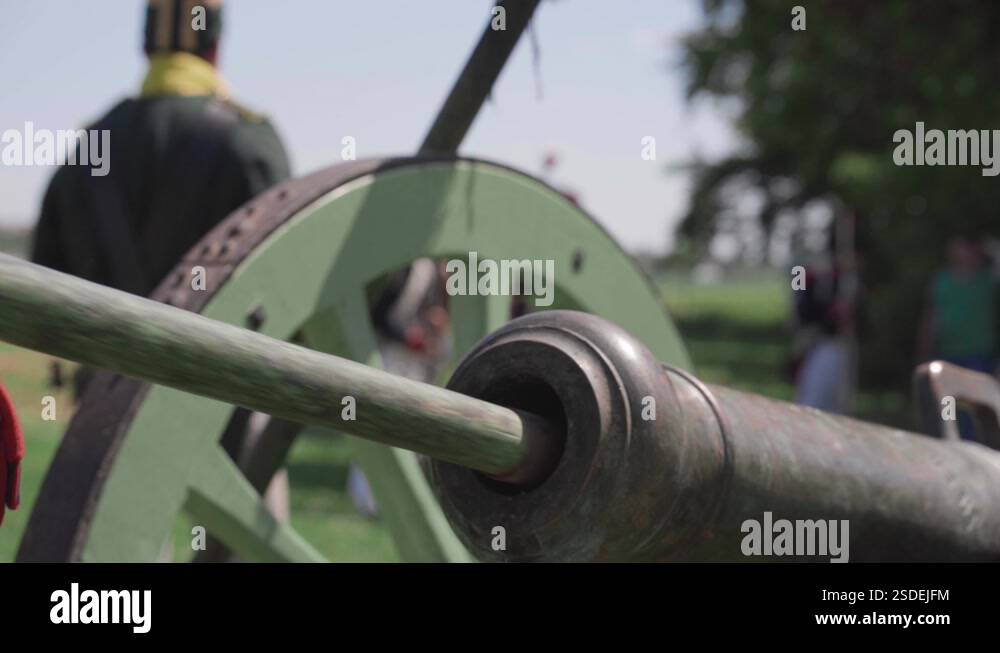 Cleaning a cannon barrel at a reenactment of the Battle of Waterloo ...