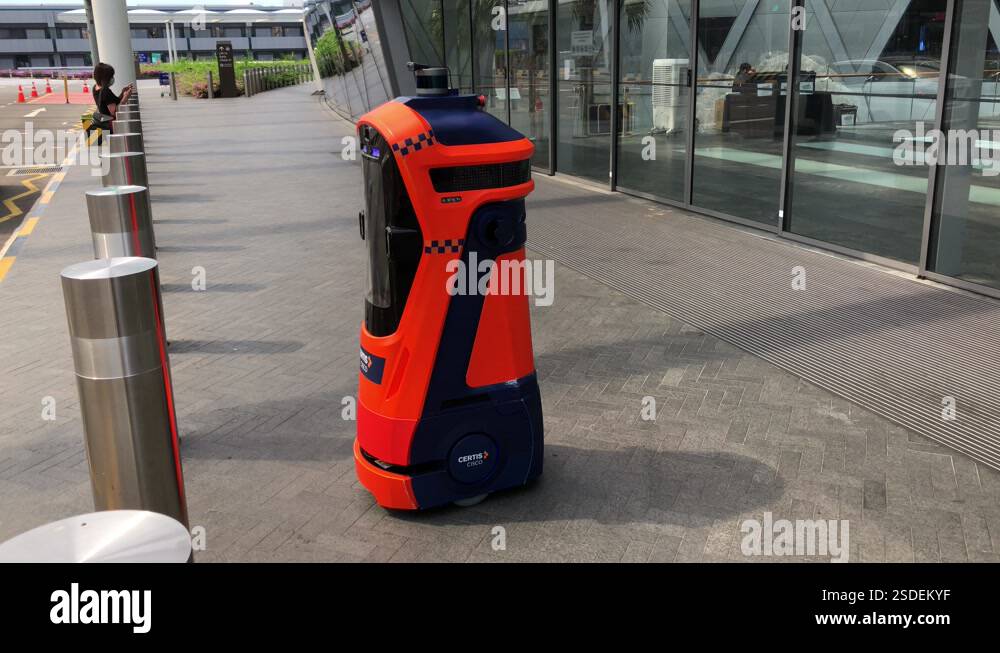 Singapore: Autonomous robot on patrol at Changi Airport, 4K Stock Video ...